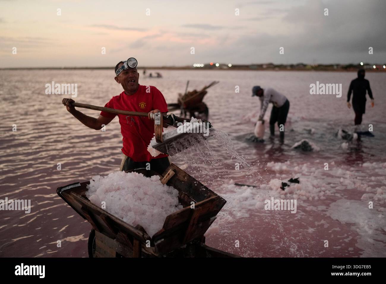 Francklin Fonseca works at the Salinas de Cumaraguas salt flats on the ...