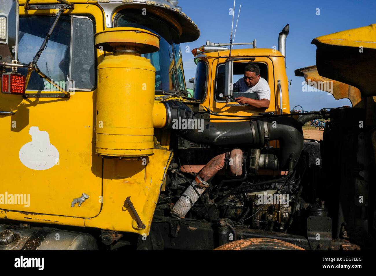 Truck driver Francisco Rodriguez wait to load slat at the Salinas de ...