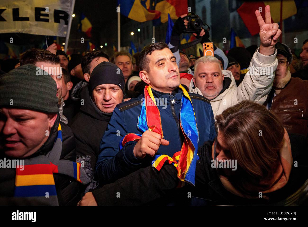 George Simion, center, leader of the Alliance for the Union of ...