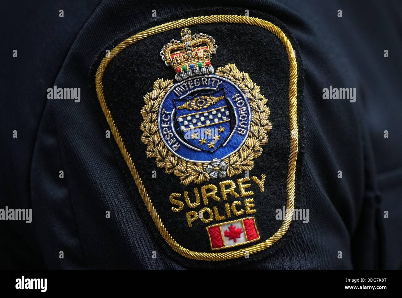 A Surrey Police Service patch is seen on an officer's uniform in Surrey ...