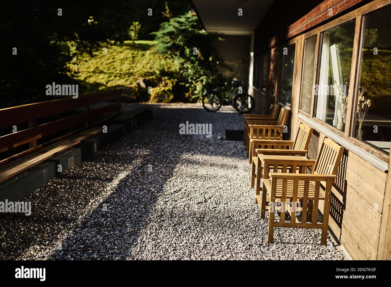 Outdoor Tables and Chairs Near a Swiss Hotel with Alpine View in Summer ...
