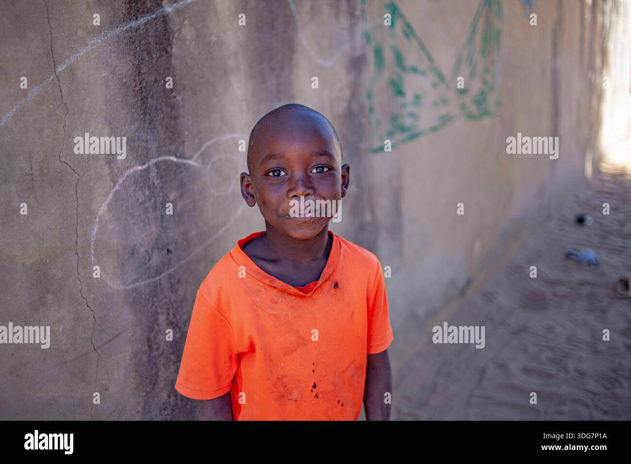 December 24, 2025, Mar Lodj, Senegal: A young African boy wearing an ...