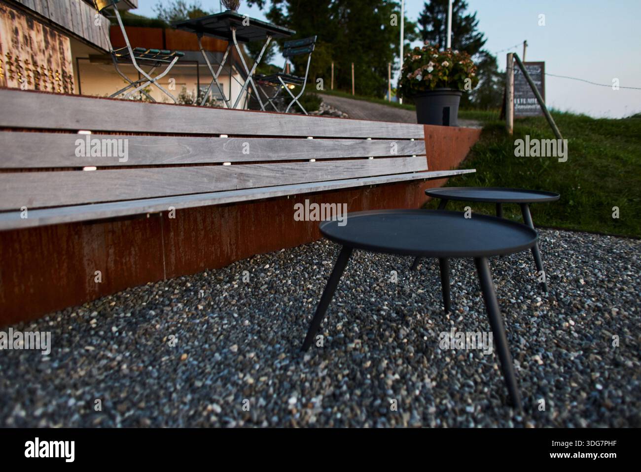 Outdoor Tables and Chairs Near a Swiss Hotel with Alpine View in Summer ...