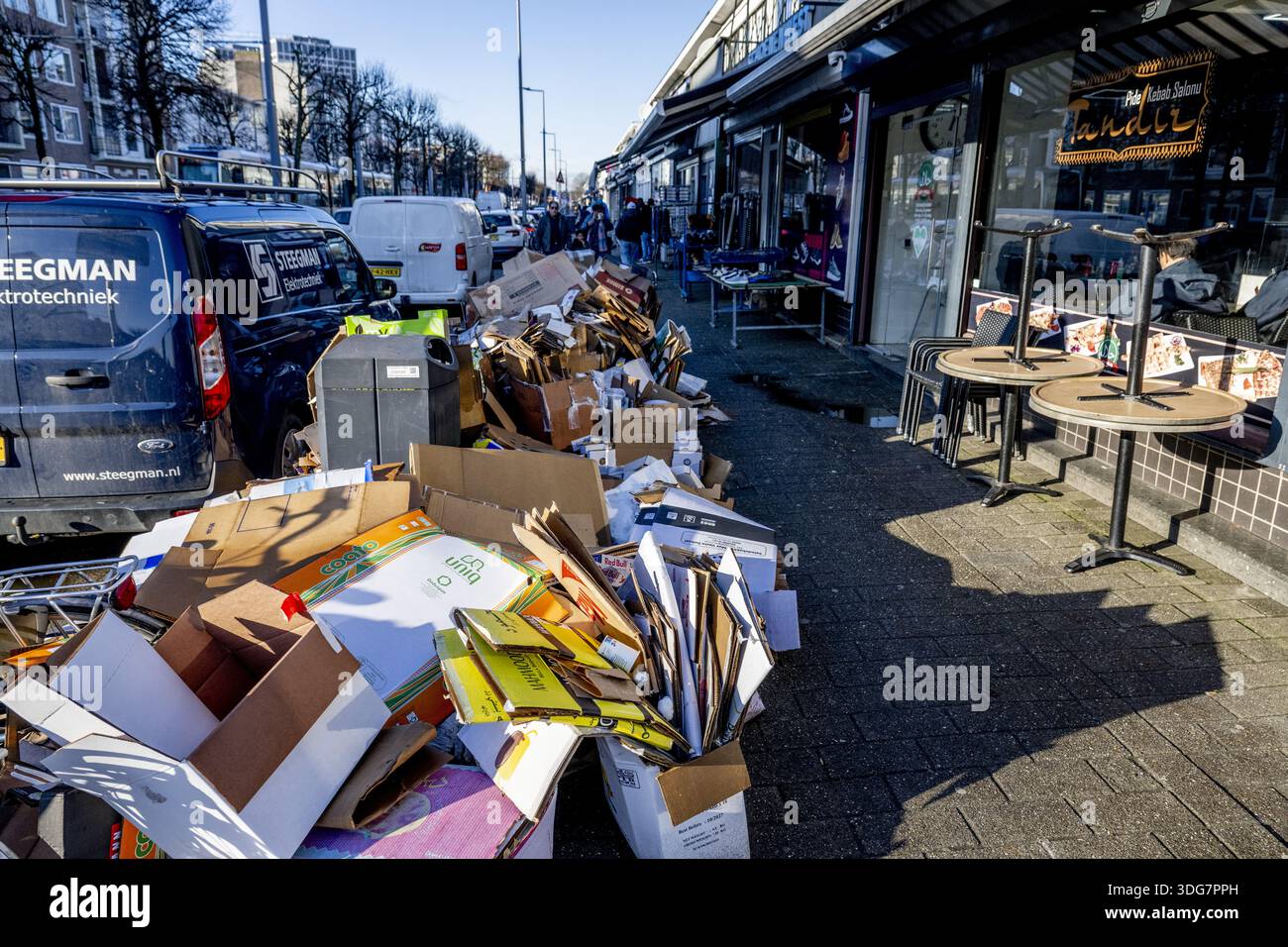 ROTTERDAM - Garbage bags in a residential area with separated waste in ...