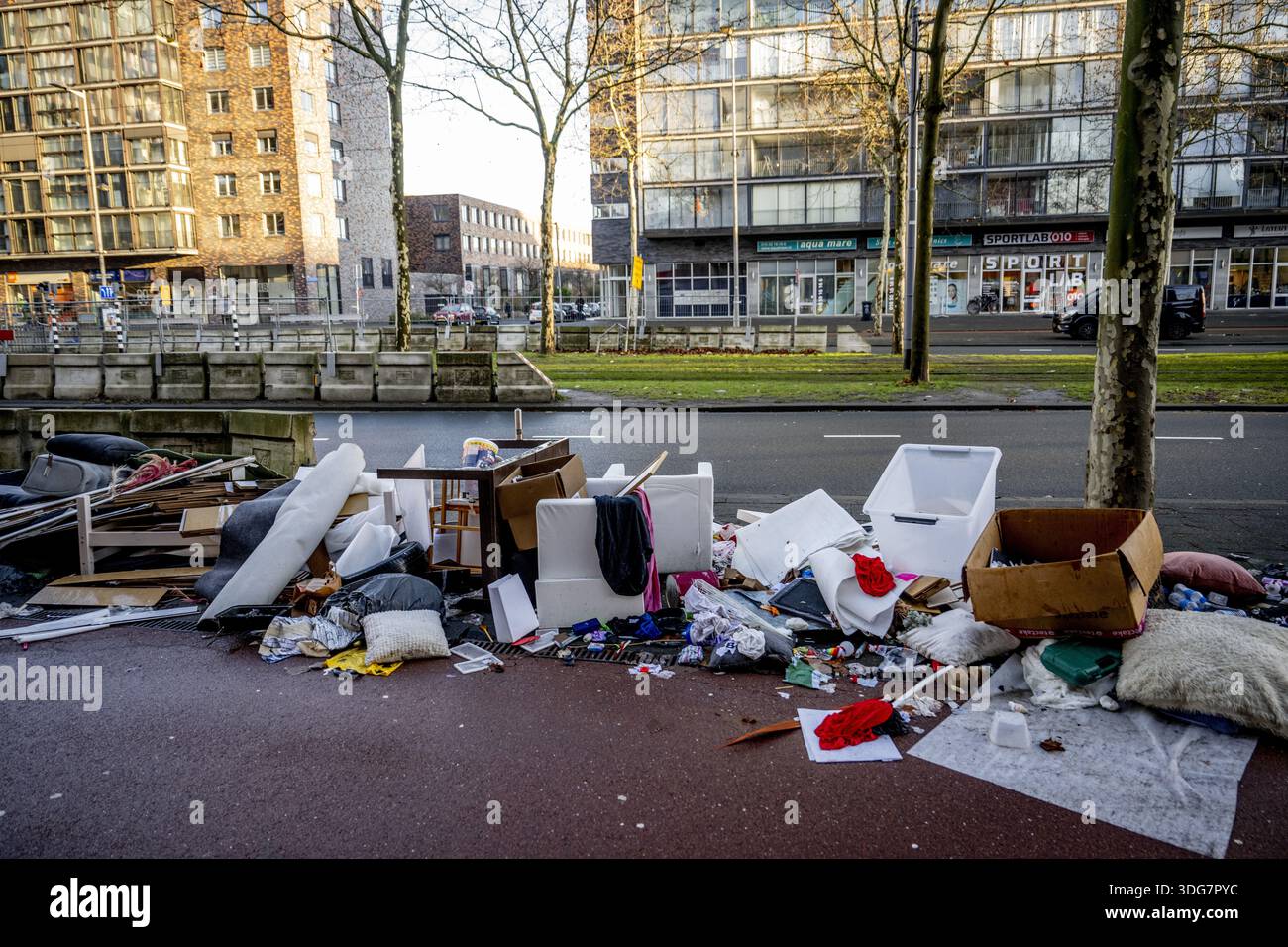 ROTTERDAM - Garbage bags in a residential area with separated waste in ...