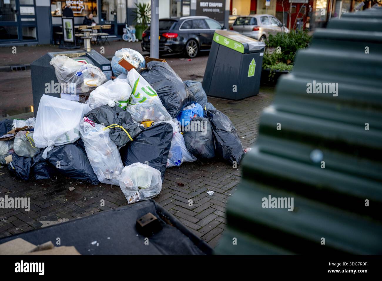 ROTTERDAM - Garbage bags in a residential area with separated waste in ...