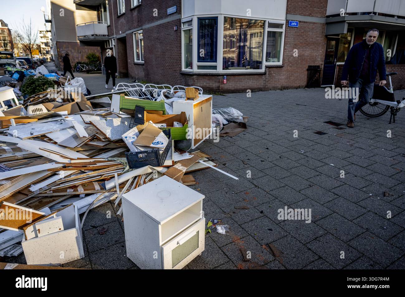 ROTTERDAM - Garbage bags in a residential area with separated waste in ...