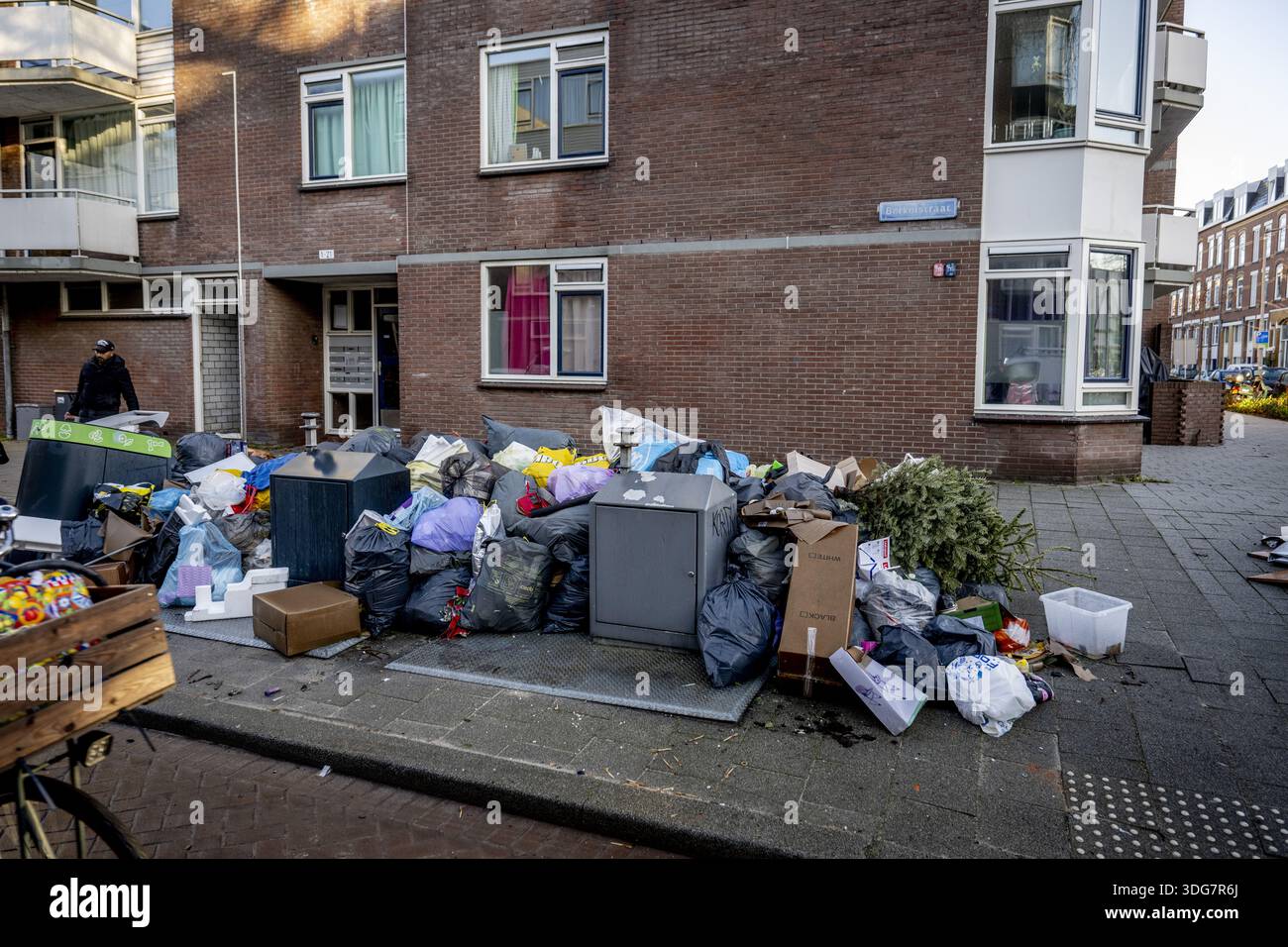 ROTTERDAM - Garbage bags in a residential area with separated waste in ...