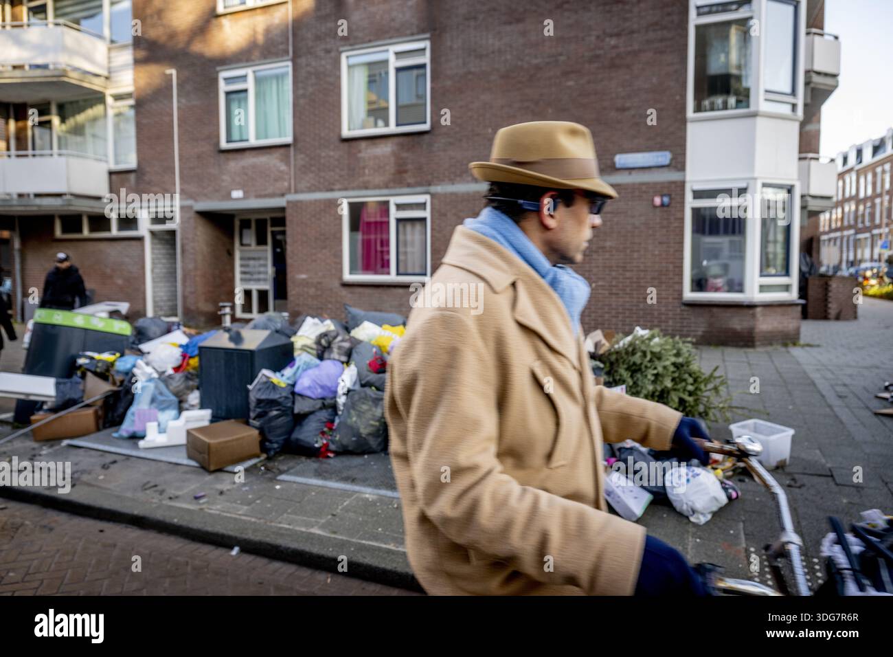 ROTTERDAM - Garbage bags in a residential area with separated waste in ...