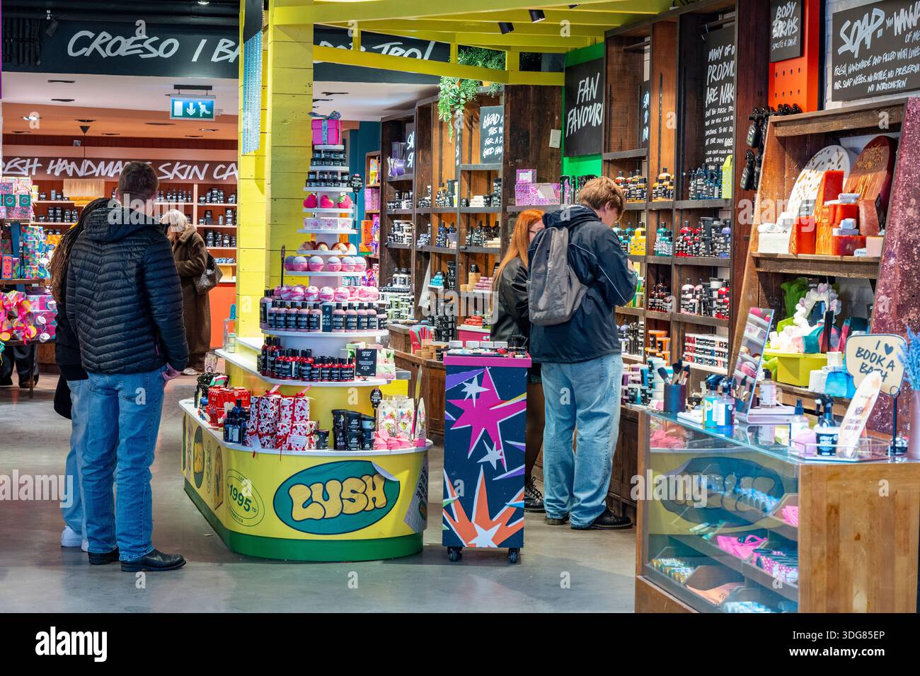 customers in the 'Lush' cosmetics store in Cardiff city centre, Wales ...