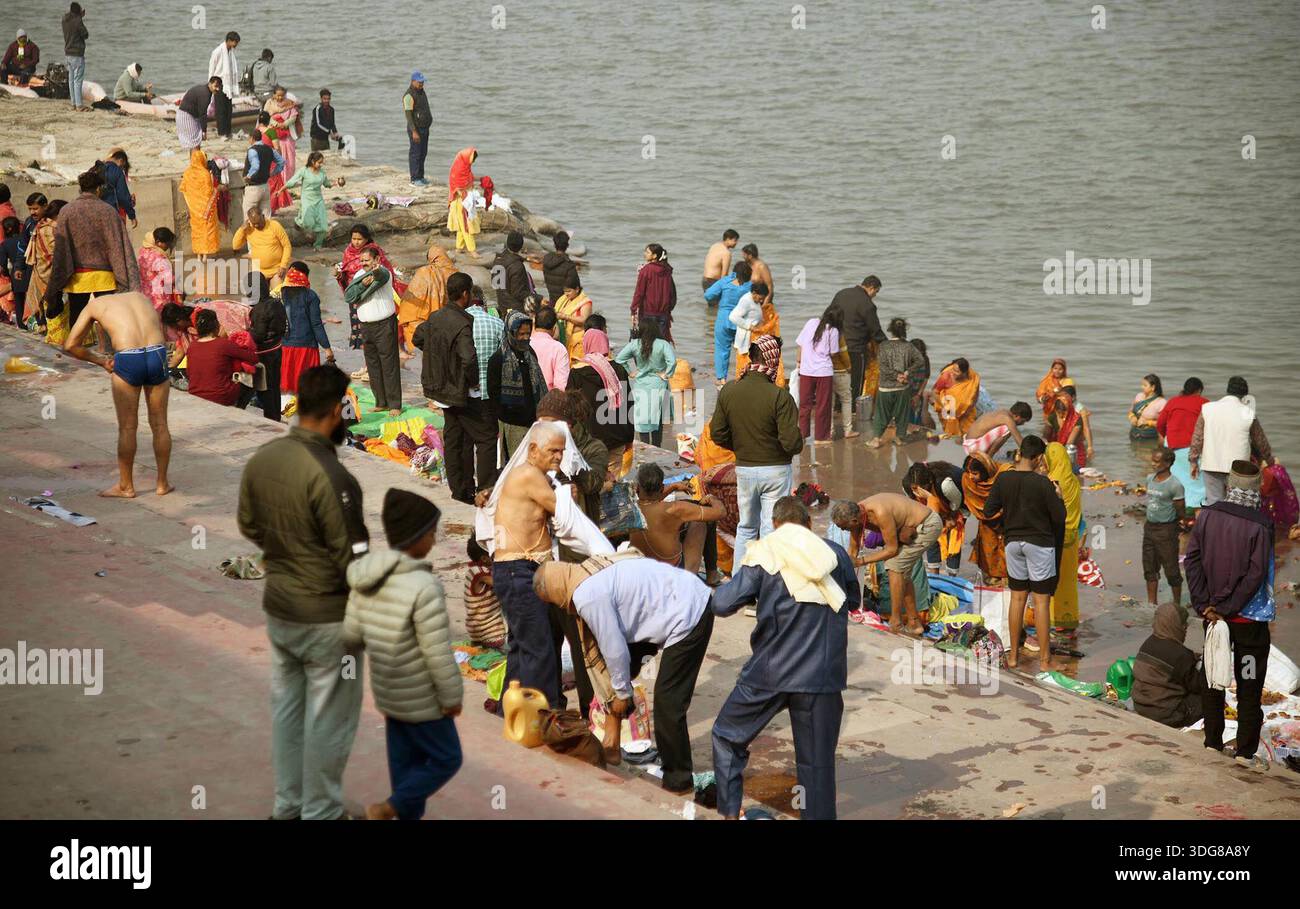 PATNA, INDIA - JANUARY 15: Devotees bathing in the Ganga river on the ...
