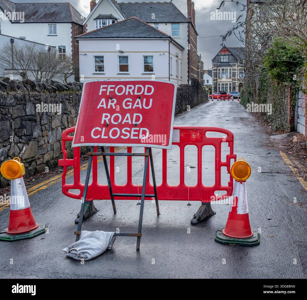 red road closed sign with cones and barrier Stock Photo - Alamy