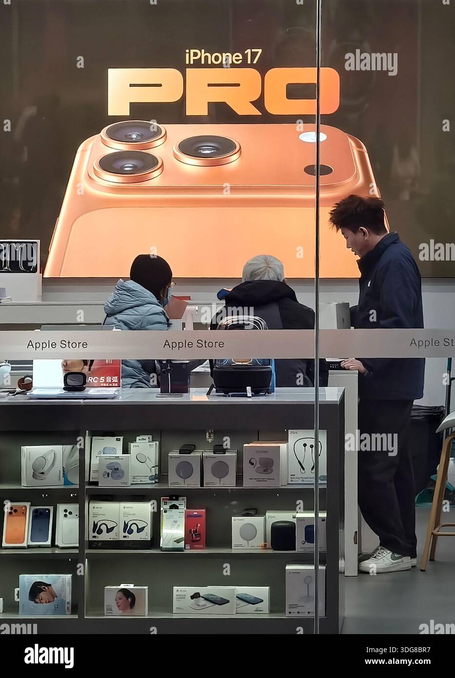 SHANGHAI, CHINA - JANUARY 15, 2026 - Customers are shopping at an Apple ...