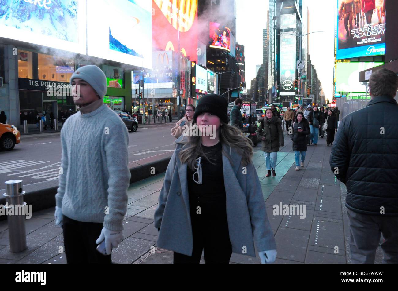 People walk in Times Square, Manhattan, New York City. (Photo by Jimin ...