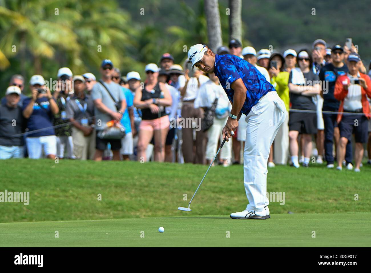 HONOLULU, HI - JANUARY 15: Hideki Matsuyama (JPN) watches his birdie ...