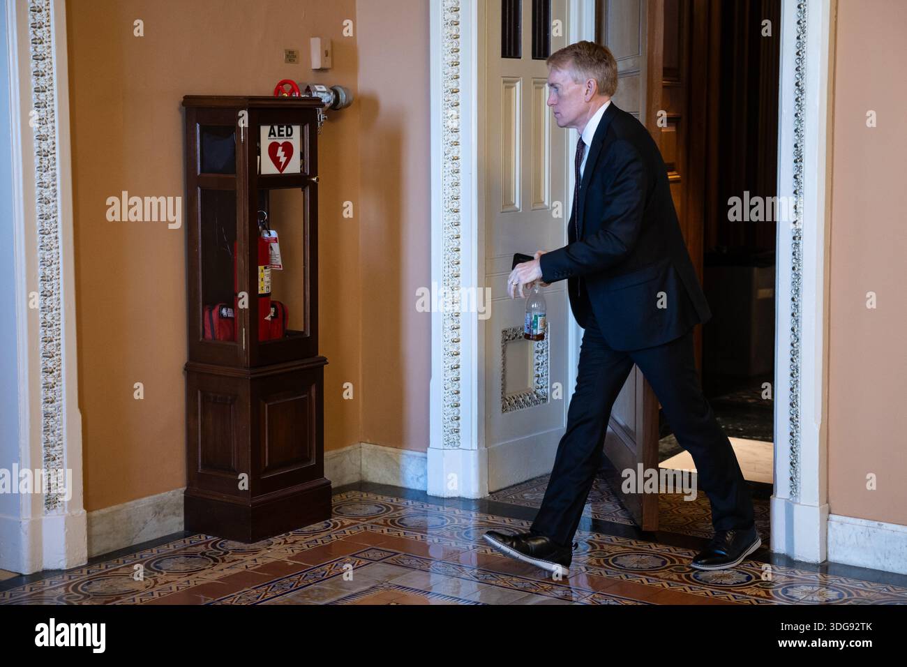 Sen. James Lankford (R-Okla.) departs a Senate Republican Conference ...