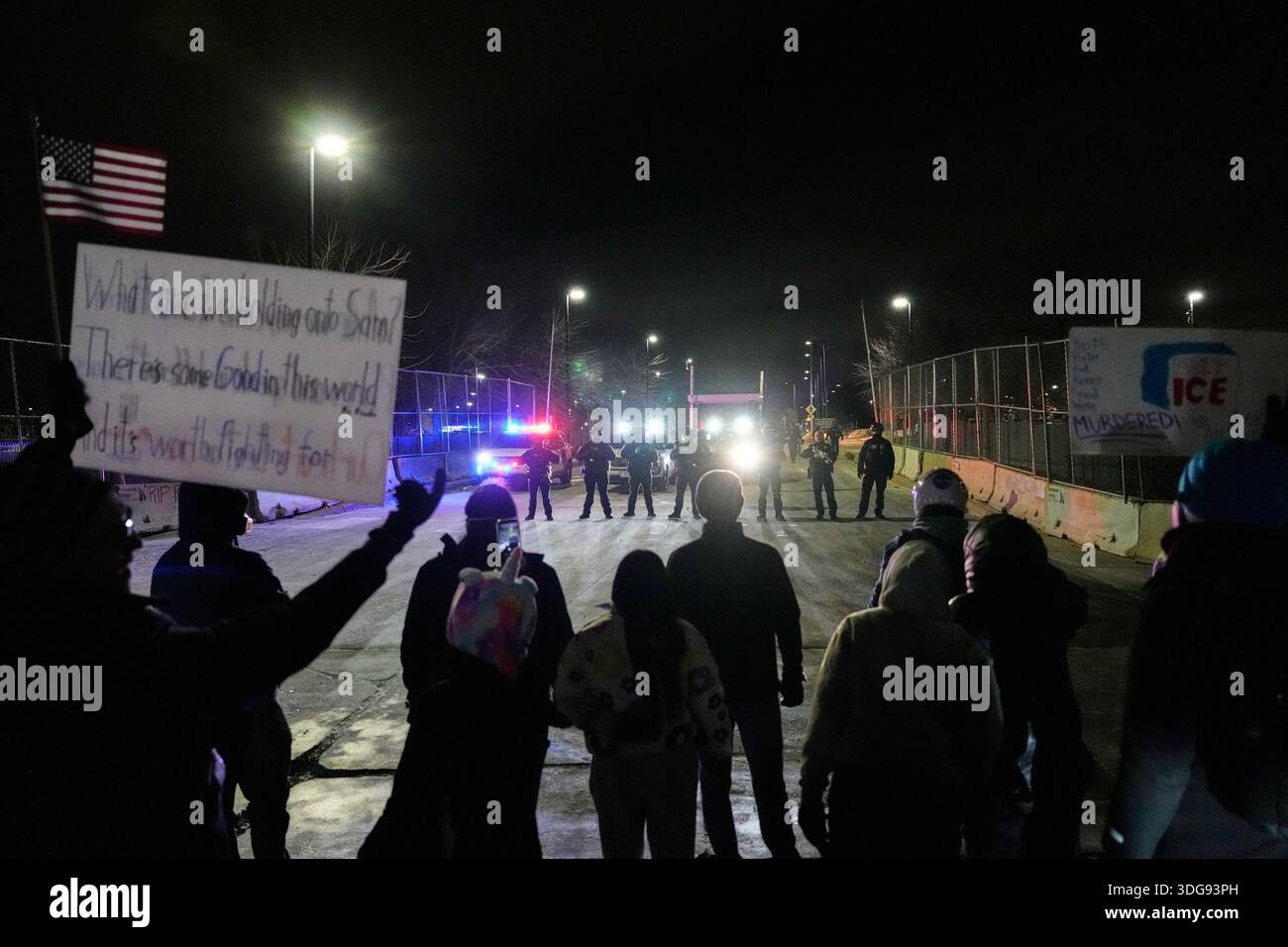 Federal immigration officers confront protesters outside Bishop Henry ...