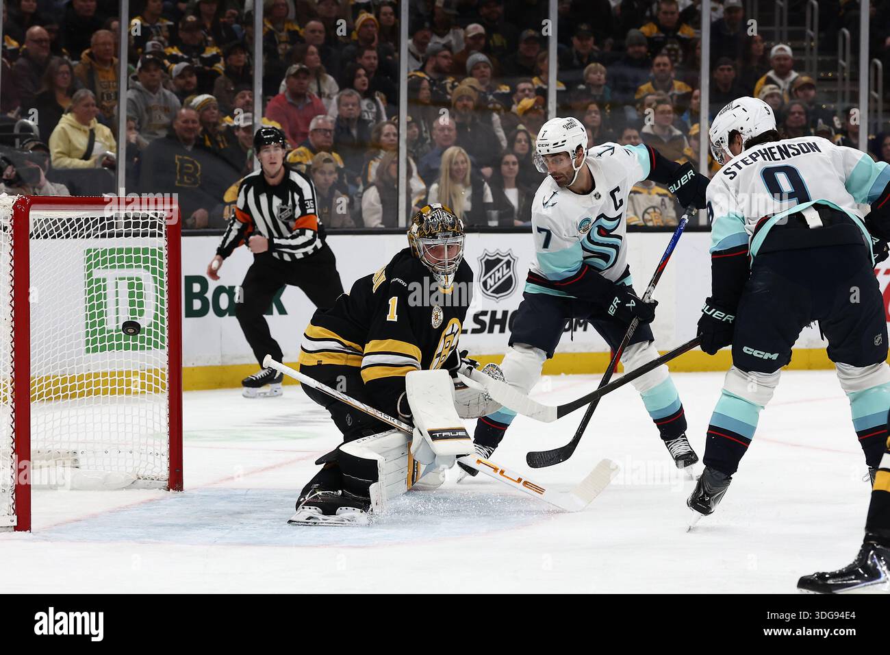 Seattle Kraken's Chandler Stephenson deflects the puck past Boston ...