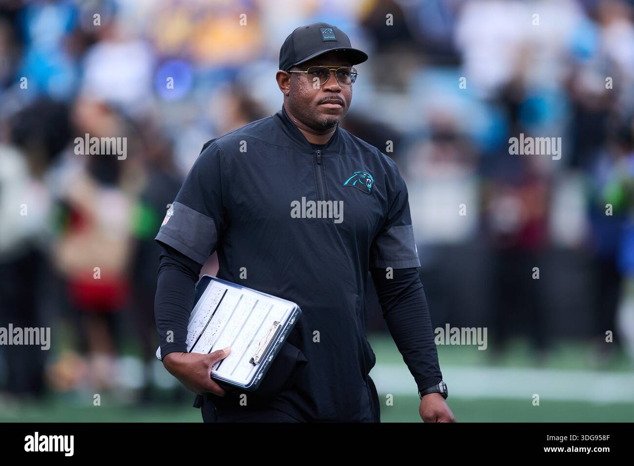 Carolina Panthers secondary coach Renaldo Hill walks on to the field ...
