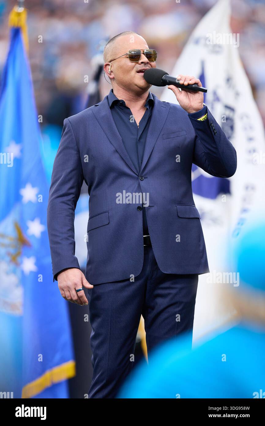 Christopher Jackson sings the National Anthem prior to an NFL wild card ...