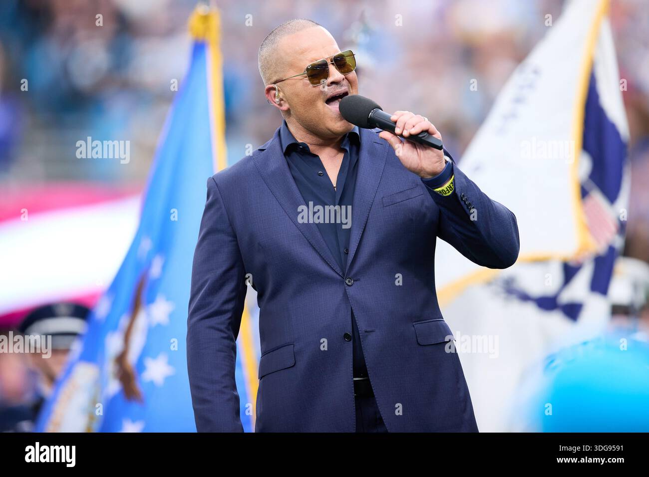 Christopher Jackson sings the National Anthem prior to an NFL wild card ...