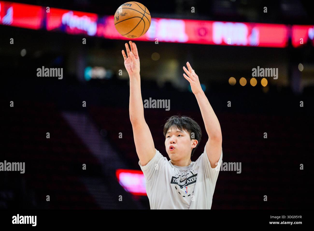Portland Trail Blazers center Yang Hansen shoots baskets during warmups ...