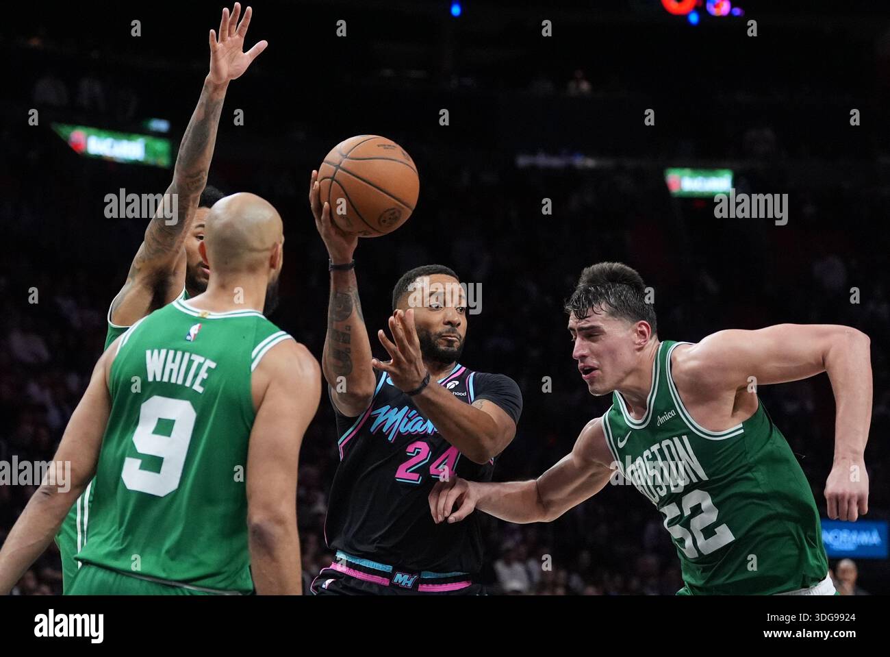 Miami Heat guard Norman Powell (24) looks to pass through Boston ...