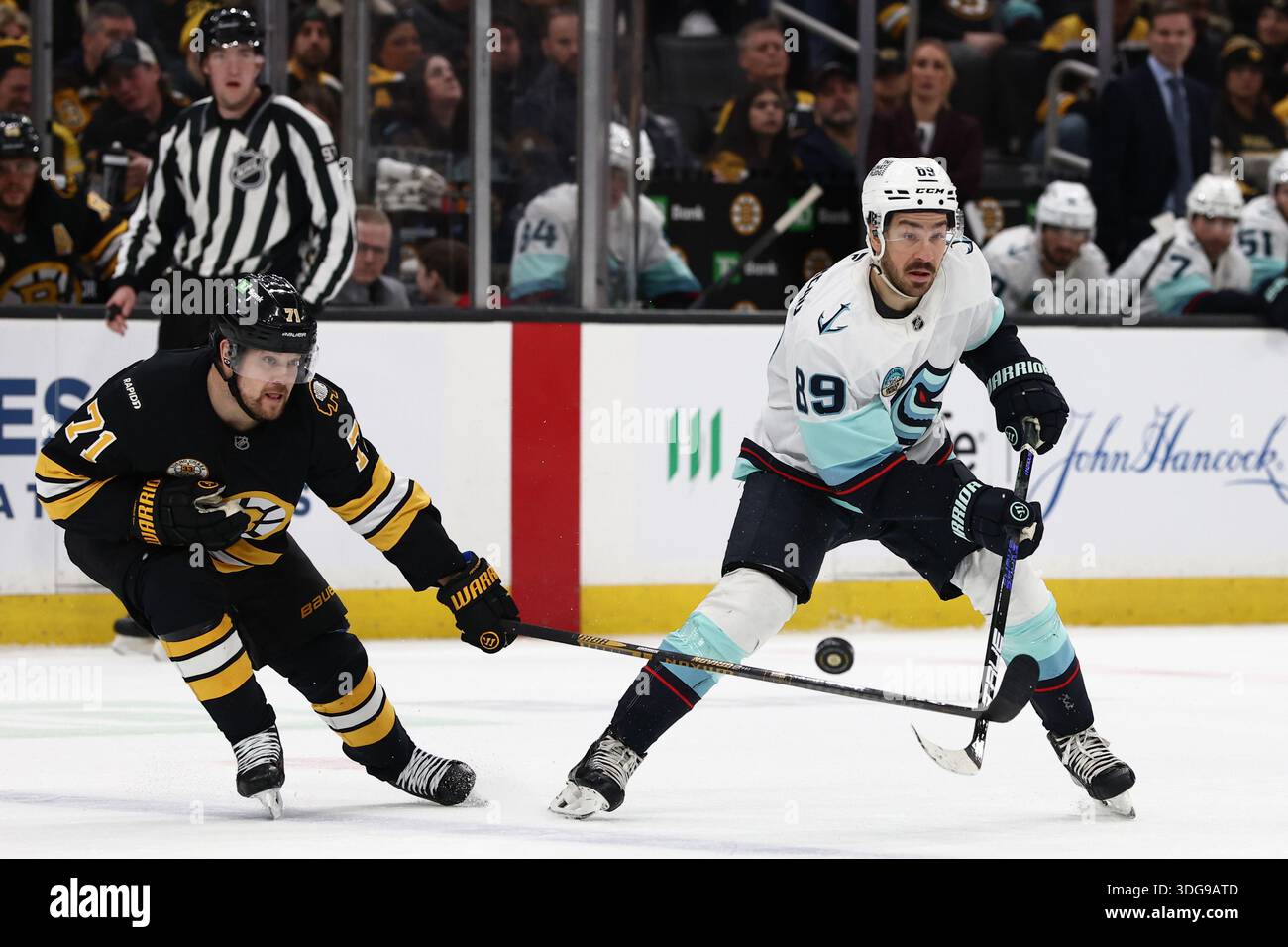 Boston Bruins' Viktor Arvidsson tries to break up a pass by Seattle ...