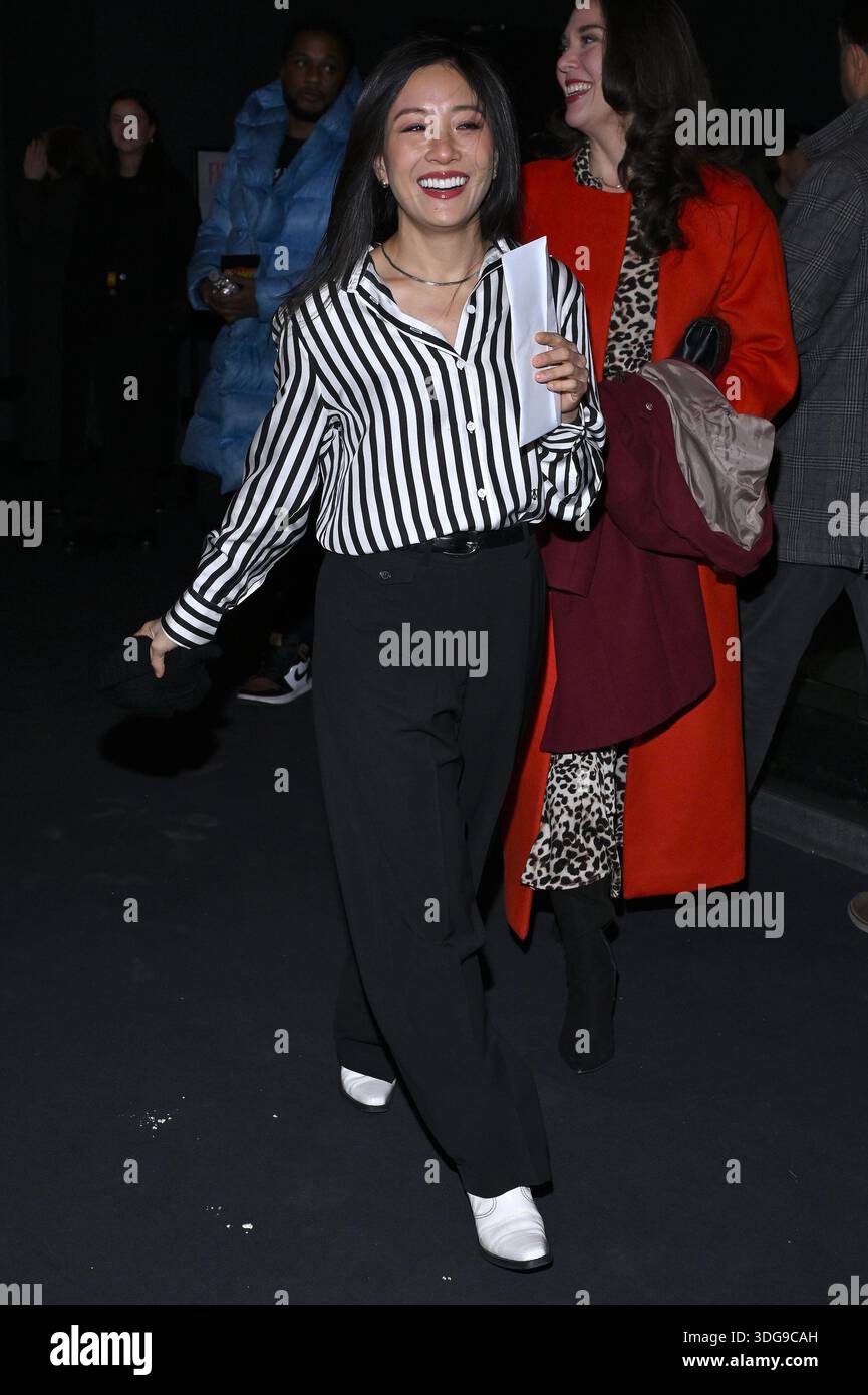 Constance Wu walking past the red carpet at 'The Wrecking Crew' New ...