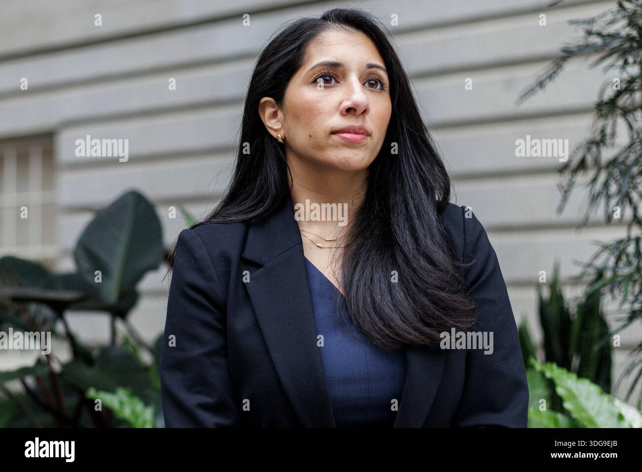 Anam Petit, a former Justice Department employee, poses for a portrait ...