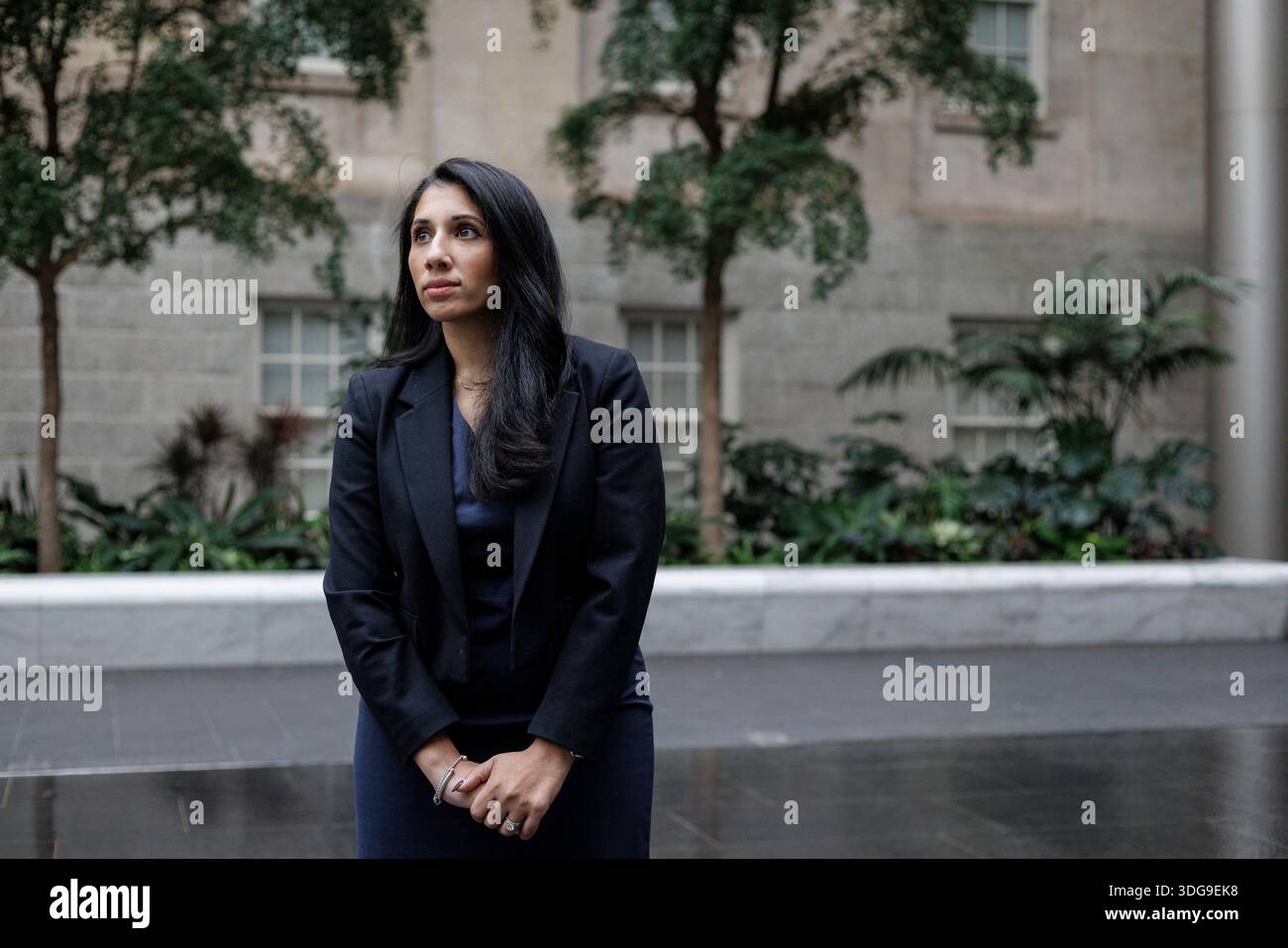 Anam Petit, a former Justice Department employee, poses for a portrait ...