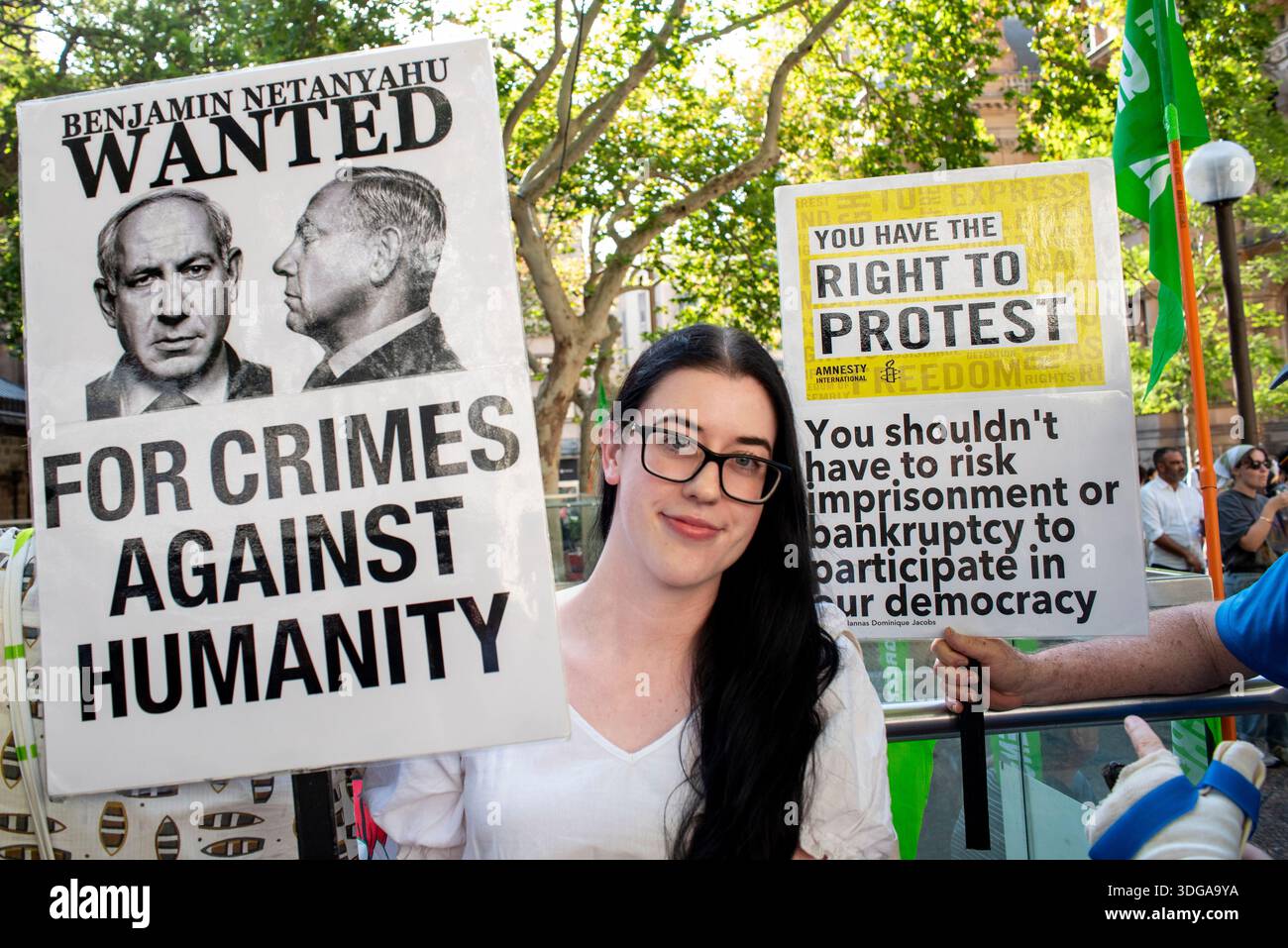 Sydney, Australia. 16 January 2026. Protesters display placards calling ...