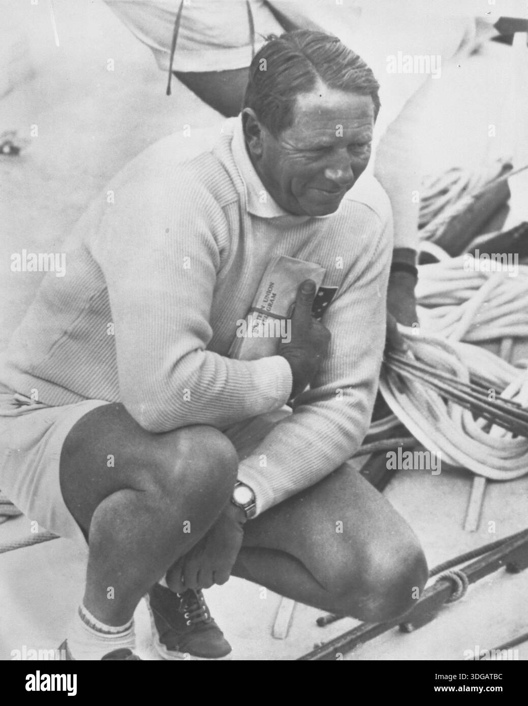 Jock Sturrock, skipper of Gretel, holds a batch of good-luck telegrams ...