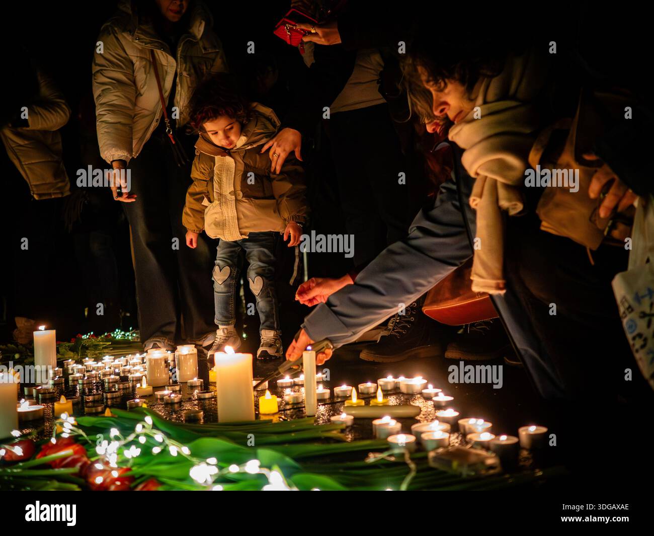 Utrecht, Netherlands. 15th Jan, 2026. A young Iranian girl looks at the ...