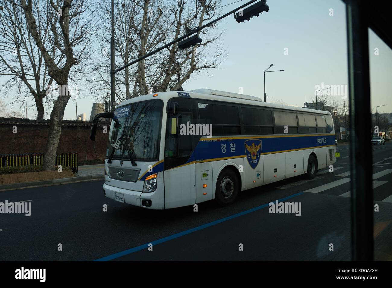 Seoul, South Korea: South Korean police bus driving along city road ...