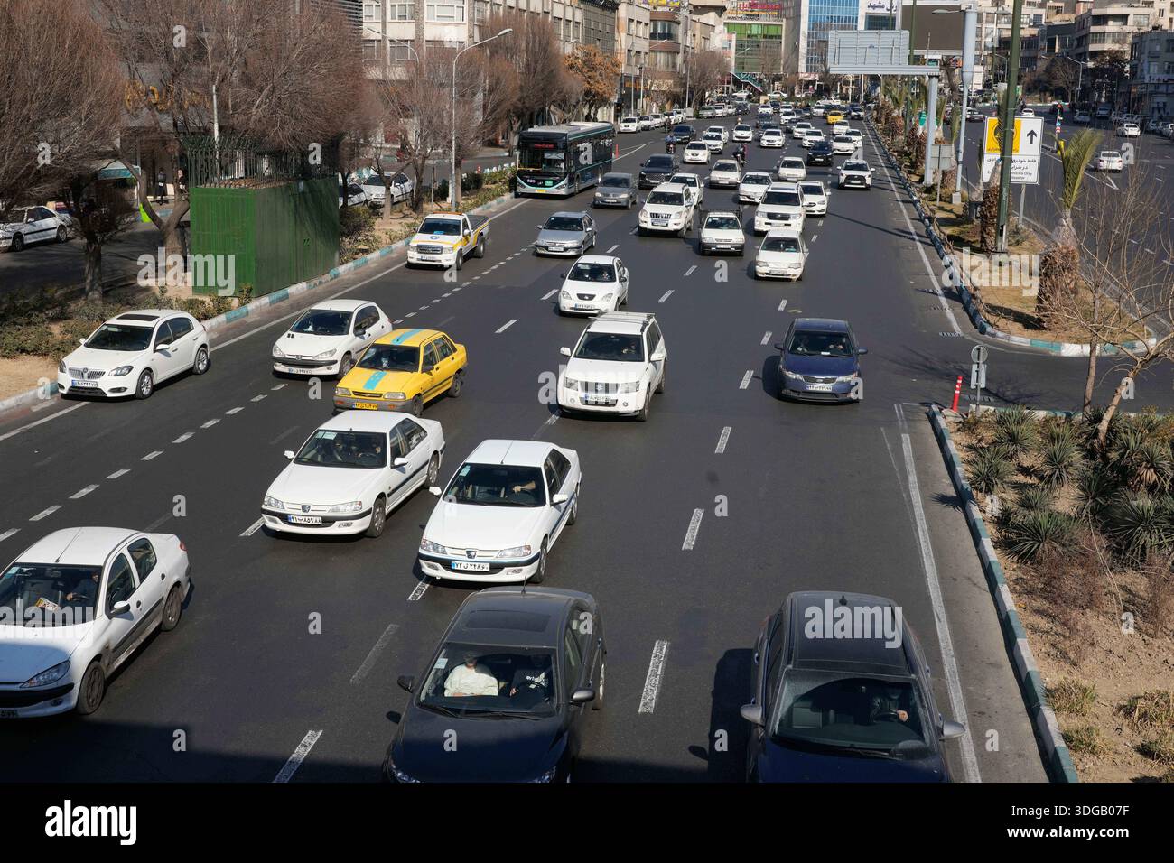Vehicles drive in downtown Tehran, Iran, Friday, Jan. 16, 2026. (AP ...