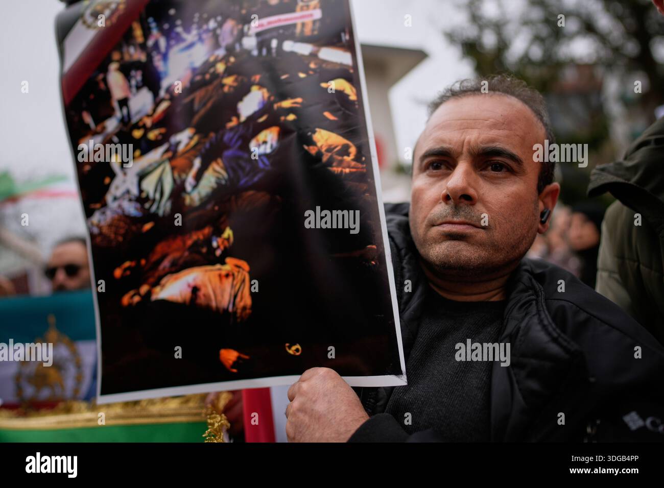 People attend a rally in support of Iran's anti-government protests, in ...