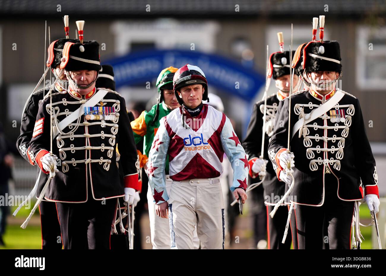 Jockey James Bowen walks out ahead of the Ronald Fletcher Baker LLP ...