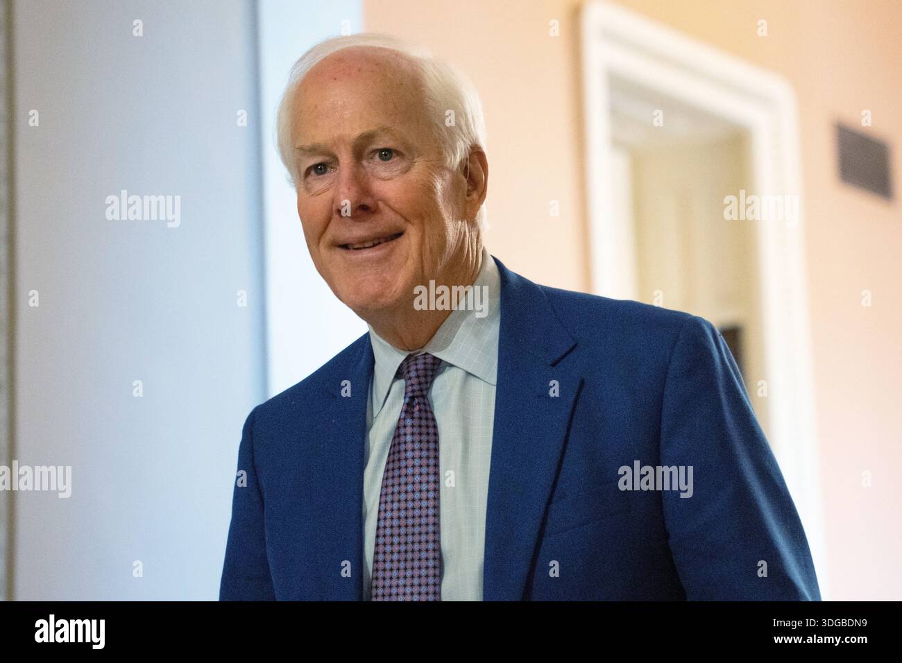 Sen. John Cornyn, R-Texas, walks through the Capitol, Thursday, Jan. 15 ...