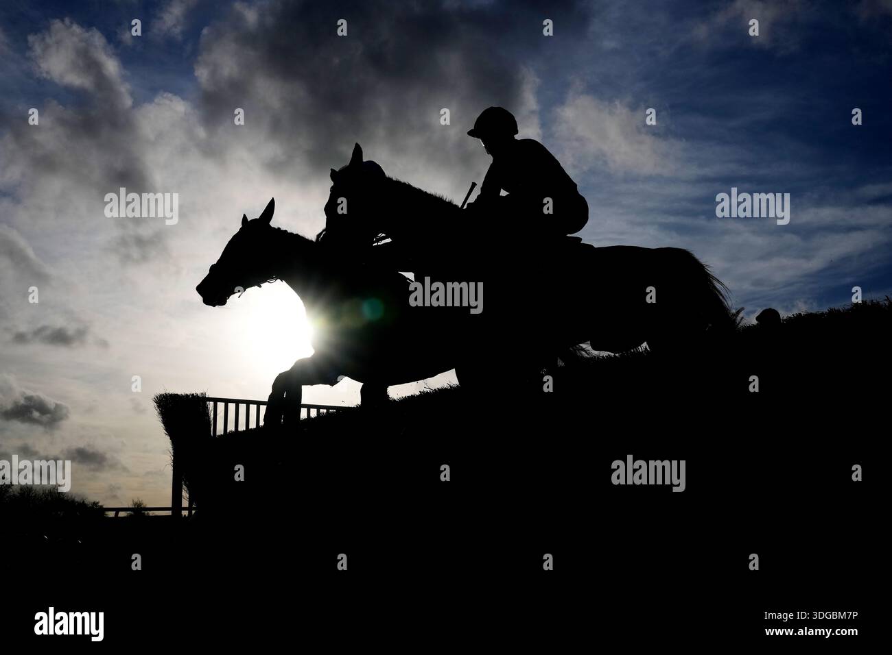 Silhouetted Runners and riders competing in the Fitzdares Telephone And ...