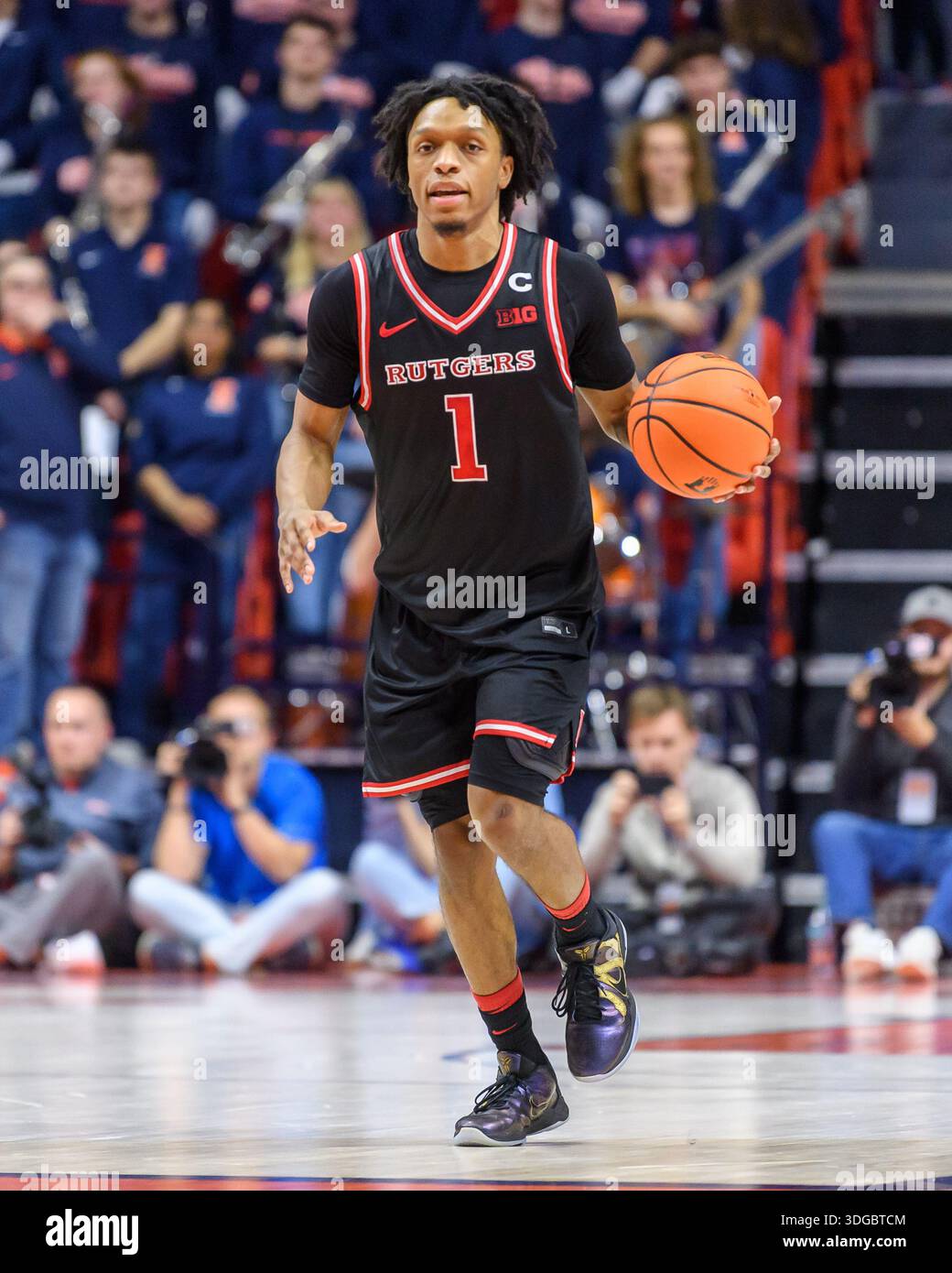 Rutgers guard Jamichael Davis advances the ball during an NCAA college ...