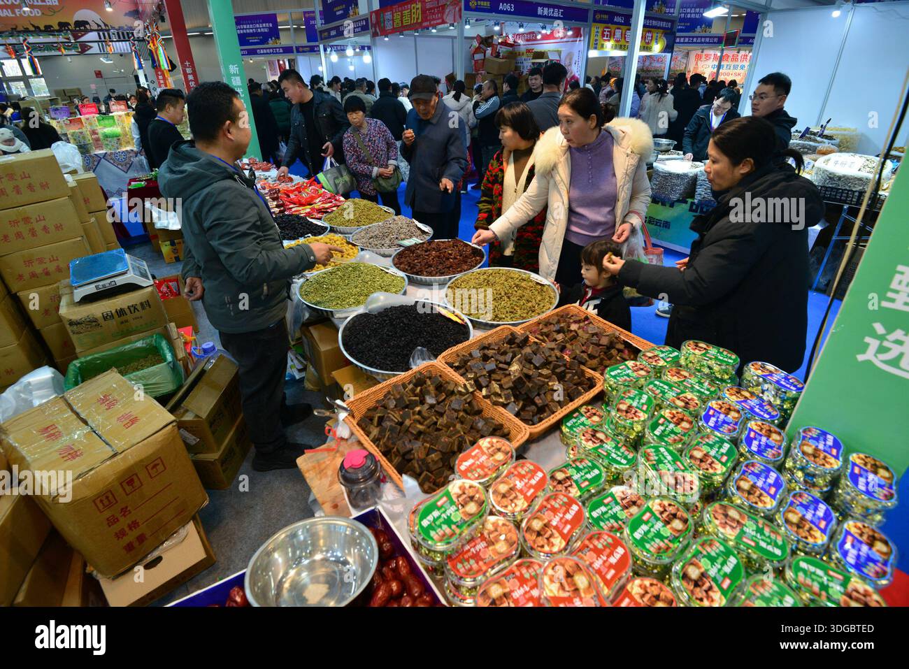 Fuyang City, China. 16th Jan, 2026. Shoppers select from an array of ...