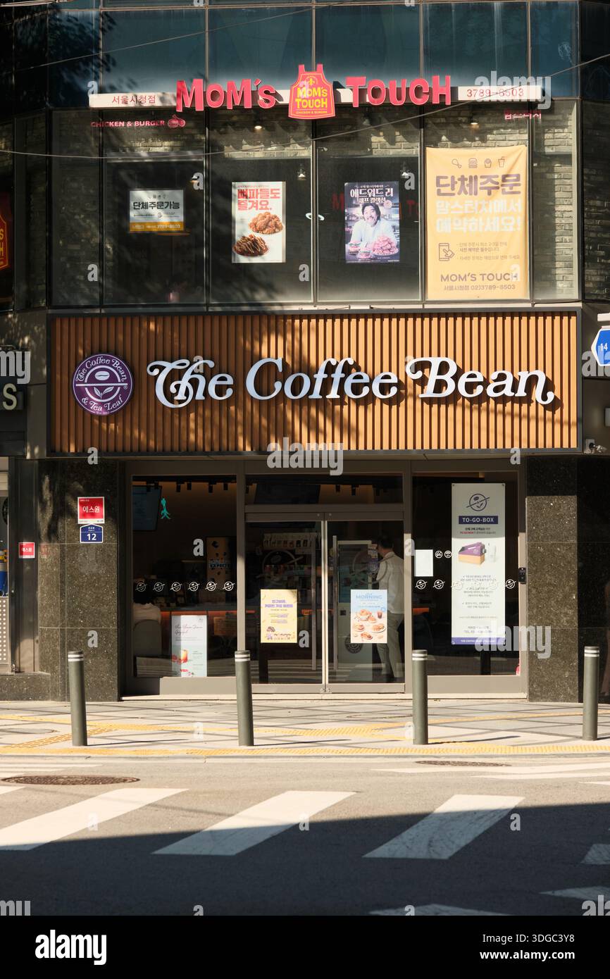 Mom’s Touch chicken restaurant and The Coffee Bean cafe storefront with ...