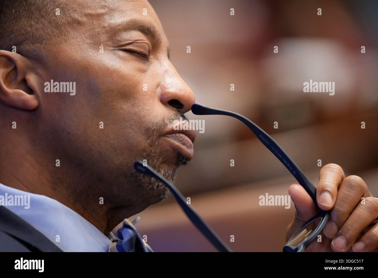 Rep Derrick Jackson, a Democrat from Tyrone, listens to Gov. Brian Kemp ...