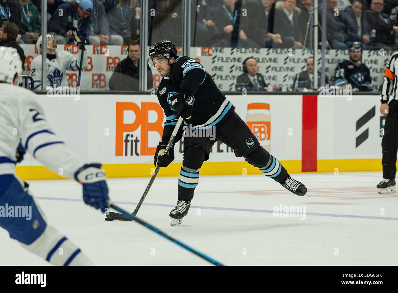 Utah Mammoth defenseman Sean Durzi (50) shoots the puck against the ...