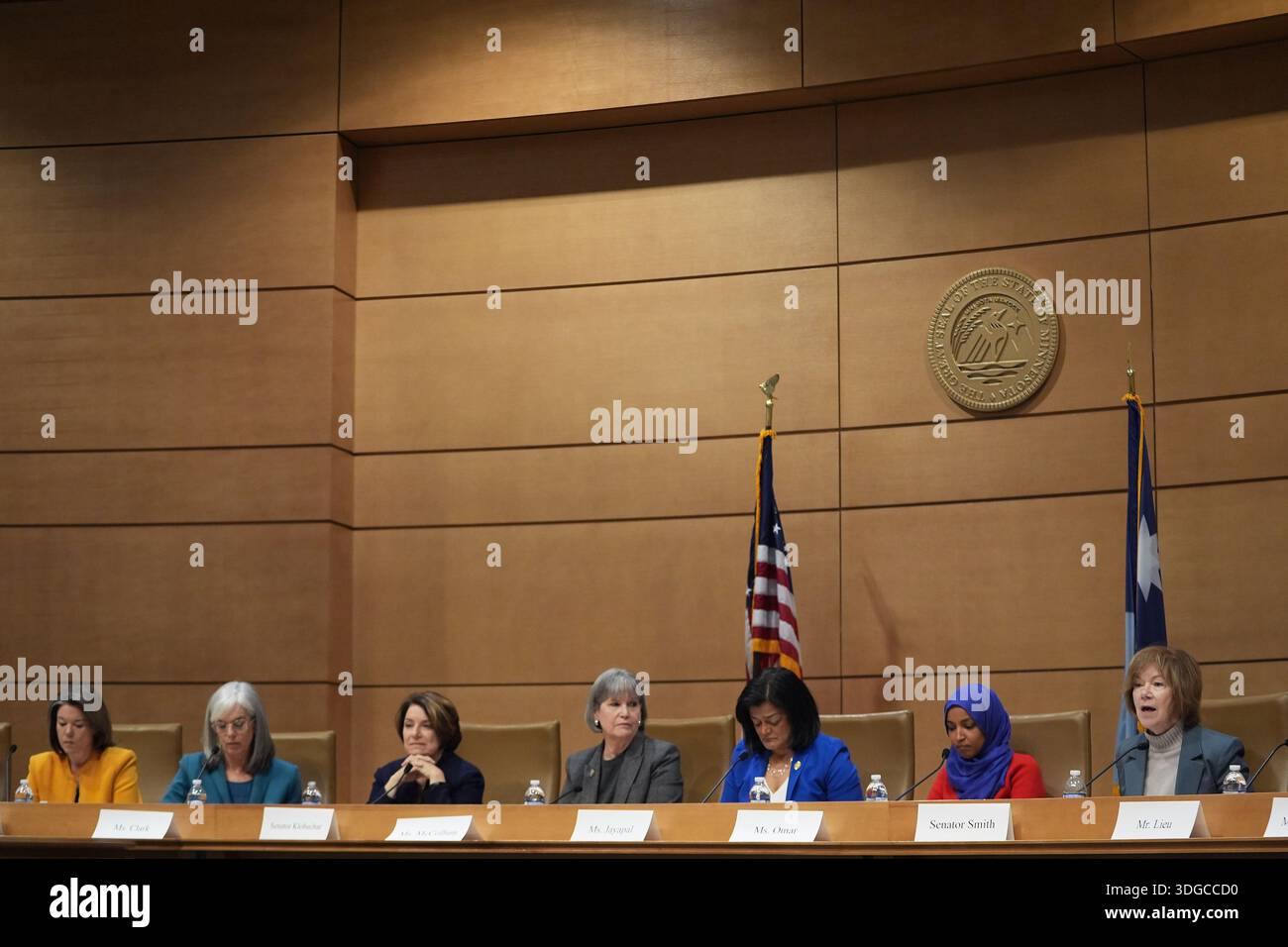 Sen. Tina smith, D-Minn, right, speaks during a field hearing on ...