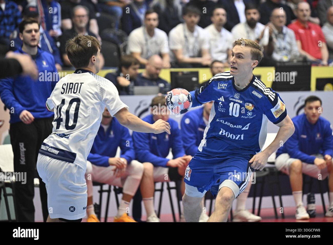 Iceland's Gisli Kristjansson, right, and Italy's Simon Sirot in action ...