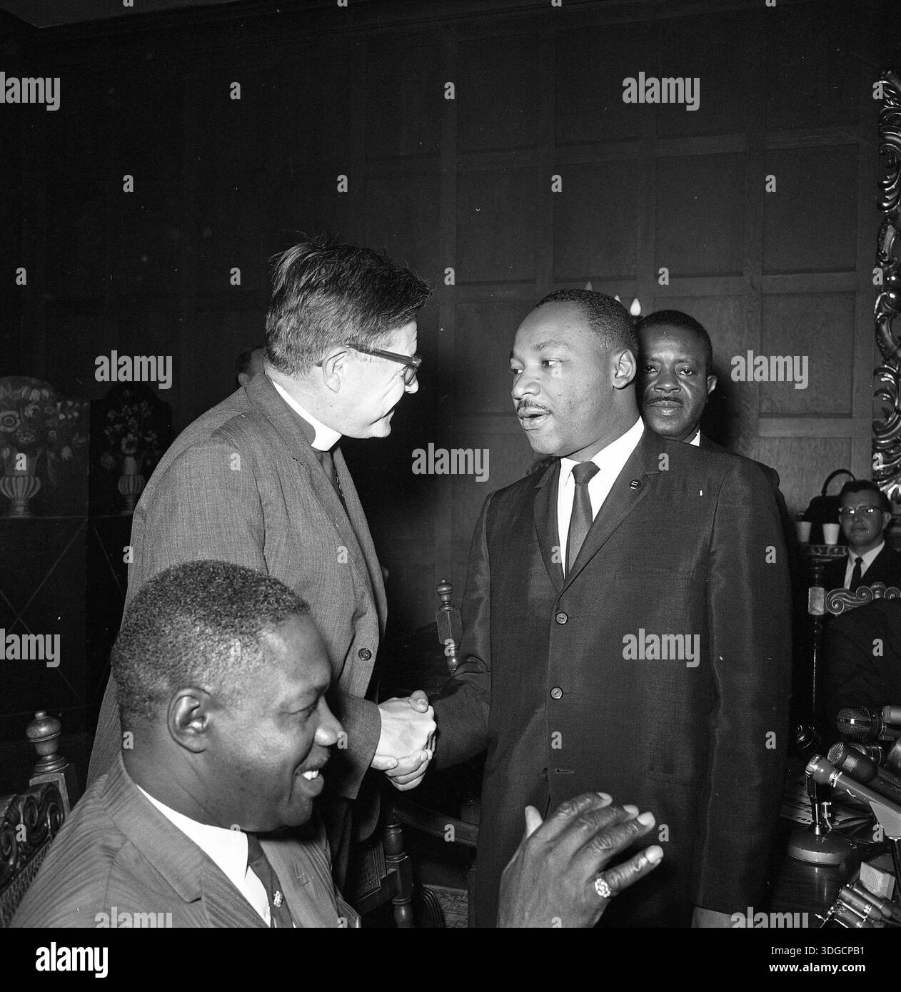 Rev. Martin Luther King Jr. shakes hands with Bishop James A. Pike ...
