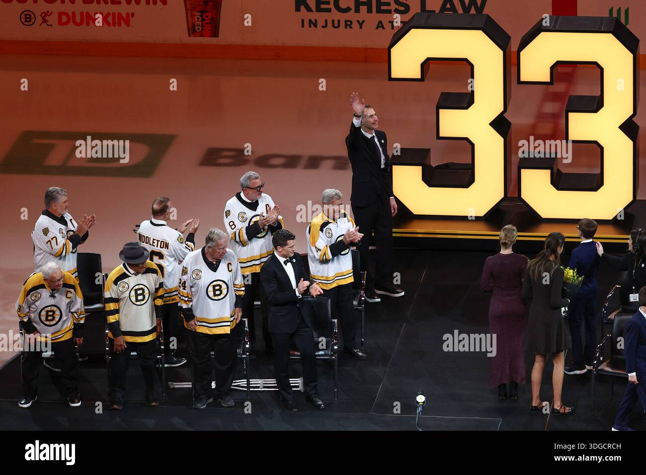 As former Boston Bruins captain Zdeno Chara waves to the crowd during ...