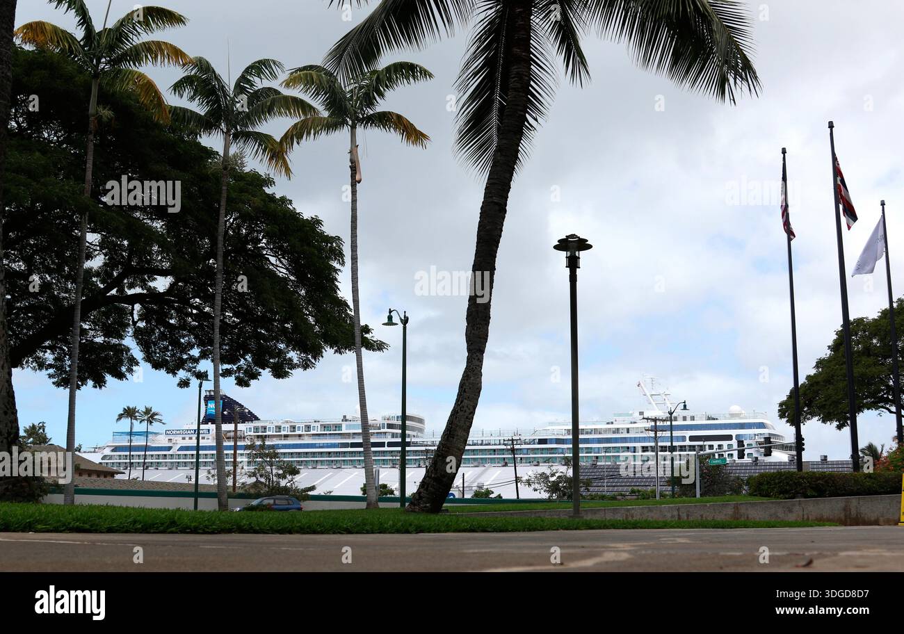 FILE - The Norwegian Jewel, background, is docked in Honolulu, March 23 ...